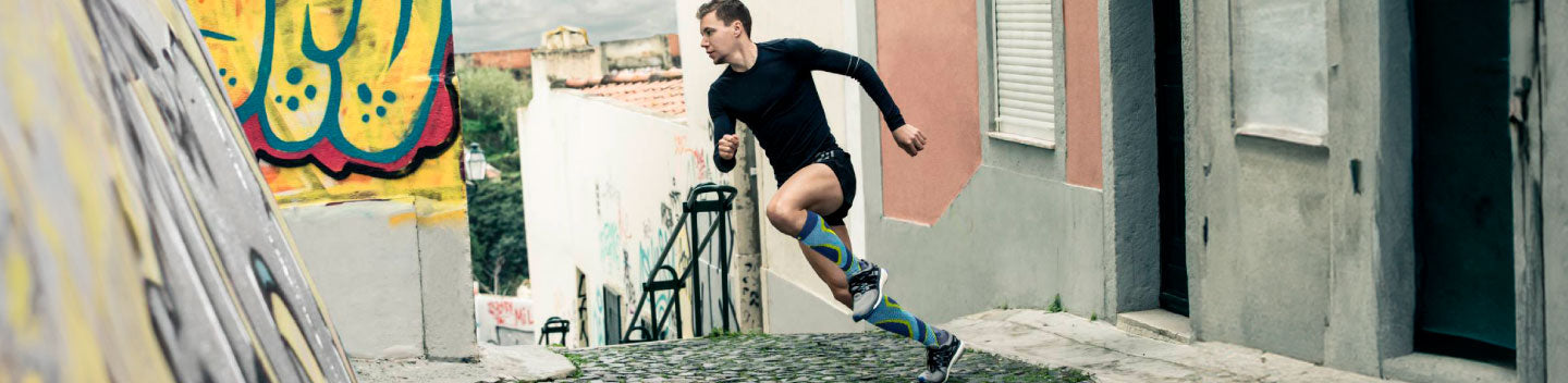 Should Triathletes Wear Compression Socks or Calf Sleeves?